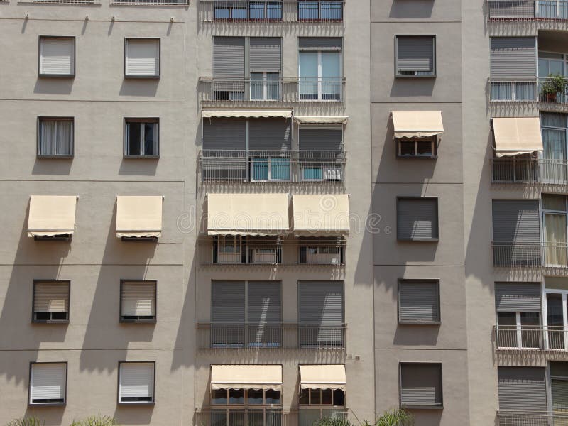 Modern Building Facade with Awning Shade and Windows Stock Photo ...