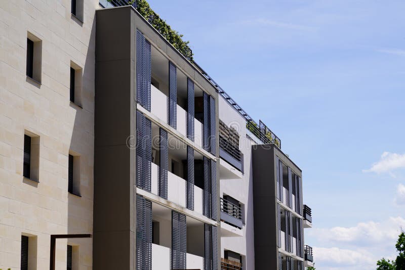 Modern Building Facade with Balcony on Sunny Day with a Blue Cloud Sky ...
