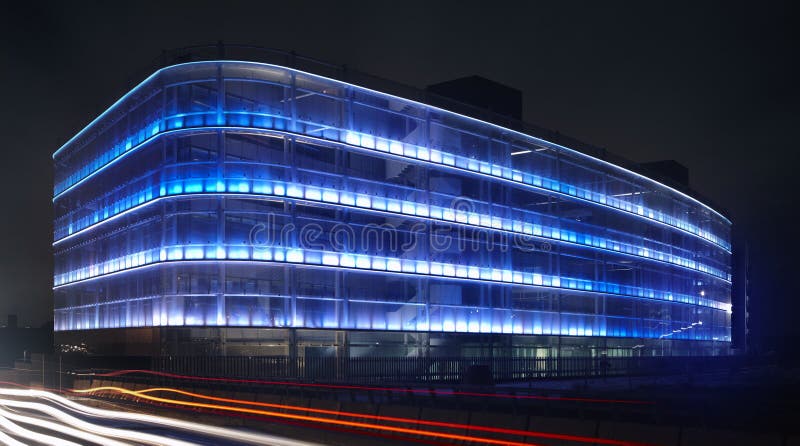 Modern Building Facade with Blue Light Stock Image - Image of town ...