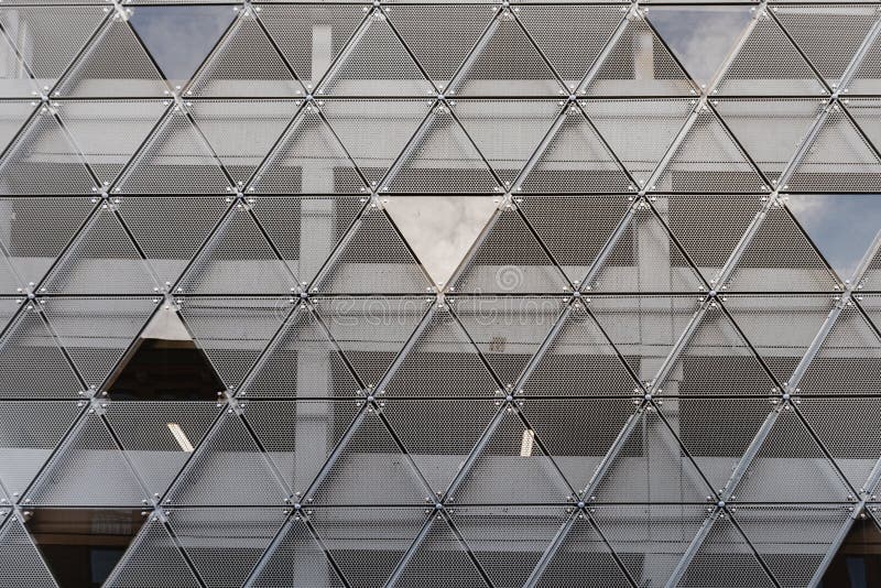 Modern Building Facade Features A Triangles Pattern Or Construction ...