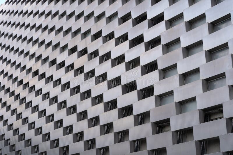 Modern Building Facade with Geometric Pattern of Windows Stock Photo ...