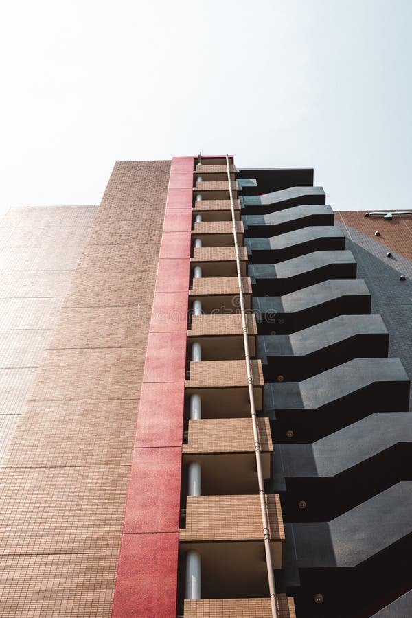 Modern Building Facade with Geometric Patterns and Contrasting Colors ...