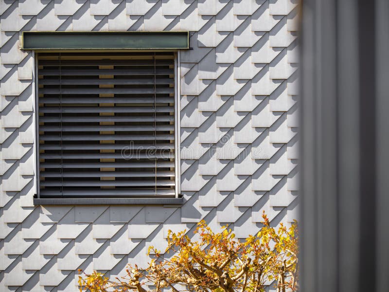 Modern Building Facade with Geometric Tile Pattern Stock Image - Image ...