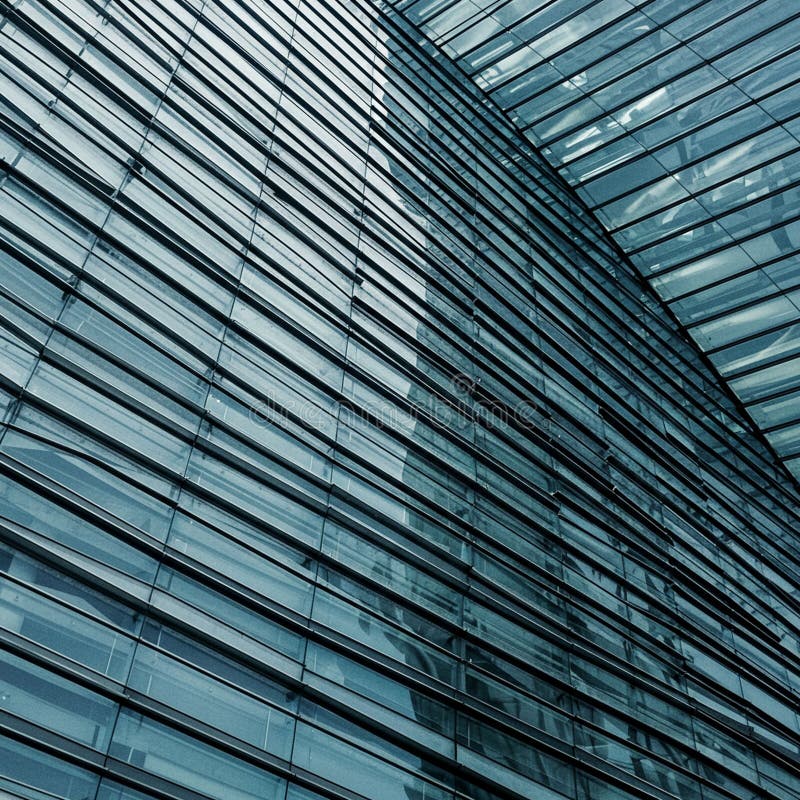 A Modern Building Facade with a Grid-like Structure Made of Glass ...