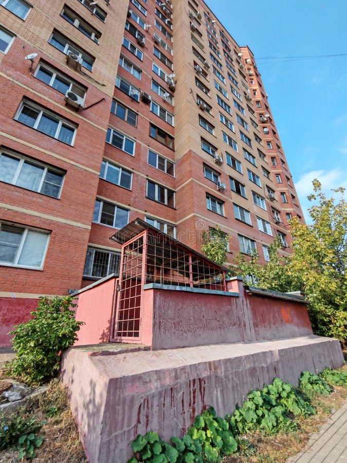 Modern Building Facade Made of Red and Gray Bricks, with Windows, Air ...