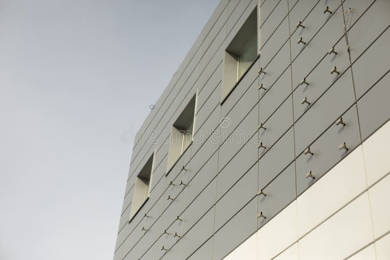 Modern Building is Gray in Color. Facing Panel on Office Building Stock ...