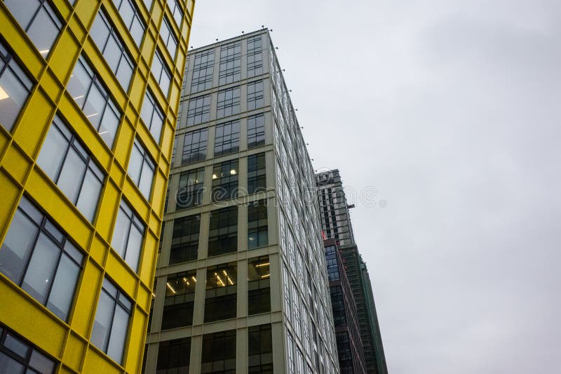 Modern Building on a Gray Sky Background. Stock Image - Image of ...