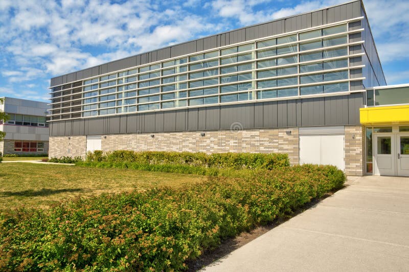 Modern Building with a Large Glass Facade and a Stone Base. Stock Image ...