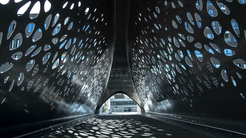 Modern Building with Lights Reflected on the Ground Stock Image - Image ...