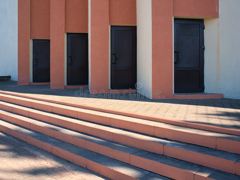 Modern Building Many Doors in a Row on the Steps Stock Photo - Image of ...
