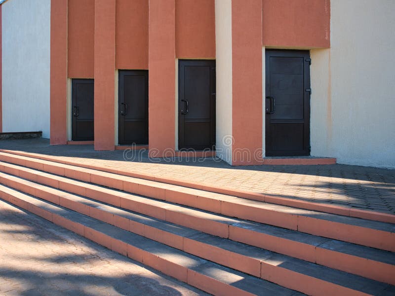 Modern Building Many Doors in a Row on the Steps Stock Image - Image of ...