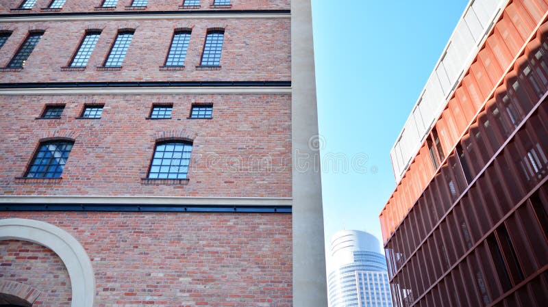 Revitalized Red Brick Building and Modern Office Building. Stock Image ...