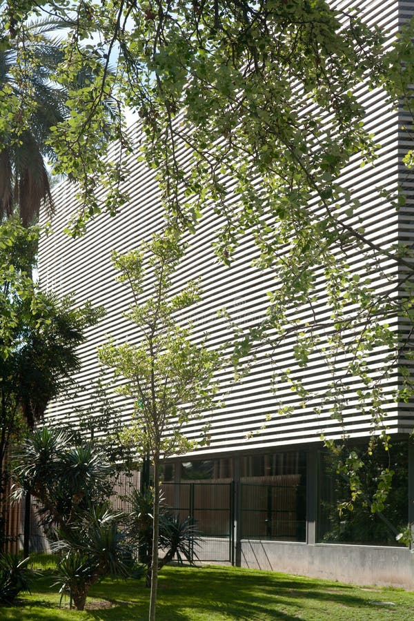 Modern building in a park stock photo. Image of grass - 25657004