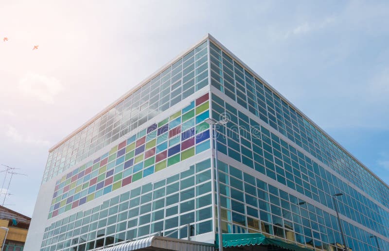 Modern Building and Pattern Colorful Glass and Sky Background Stock ...