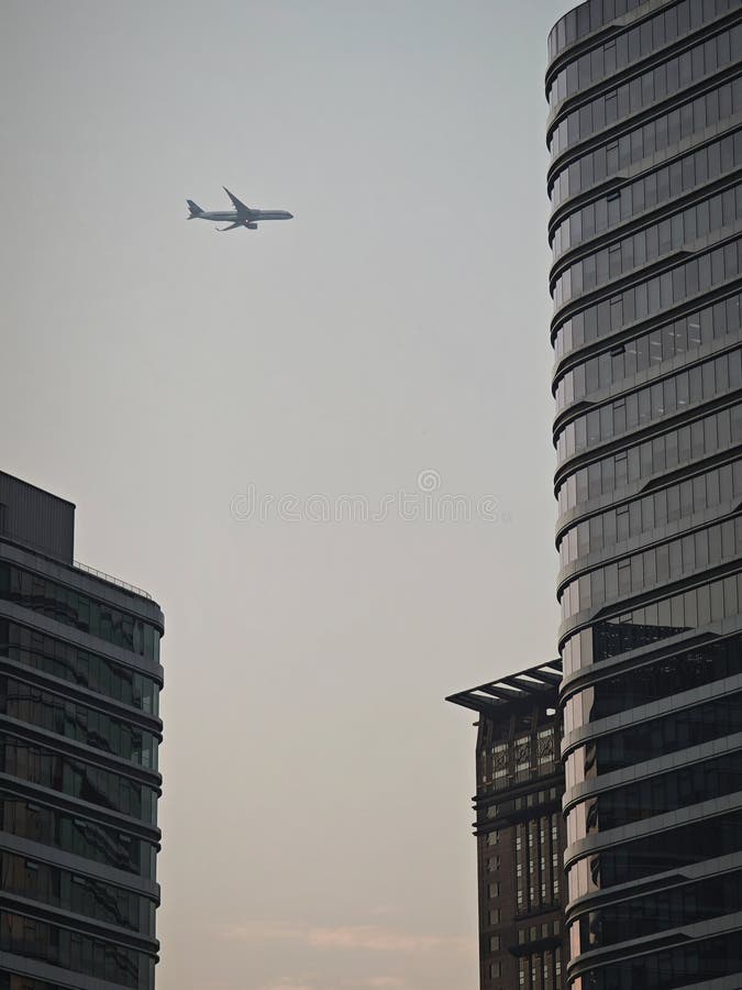 Modern Building with Plane in Guangzhou China Stock Photo - Image of ...