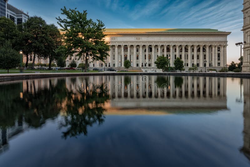 Modern Building Reflected in the Still Waters of a Pond at the NY State ...