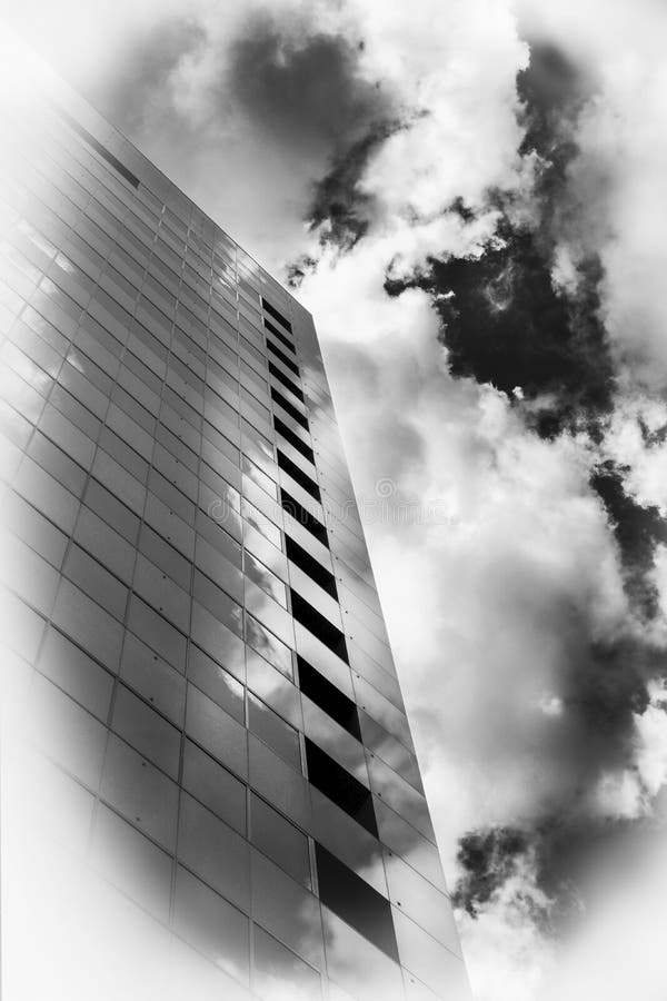 Modern Building Reflecting Clouds in Turbulent Sky B & W Stock Image ...