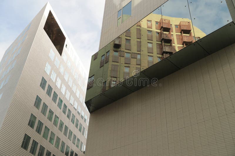 Modern Building Reflection in Mirrored Facade with Geometric ...