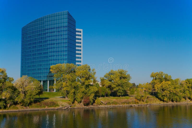 Modern building on river stock image. Image of beauty - 11603339