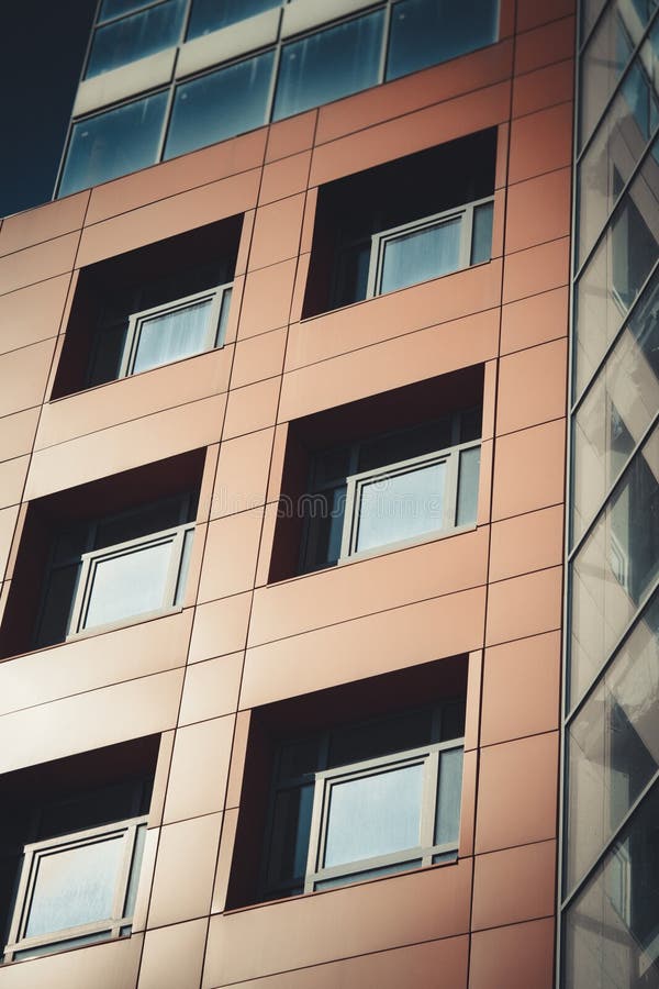Modern Building with Square Windows and Red with Deep Shadows Stock ...