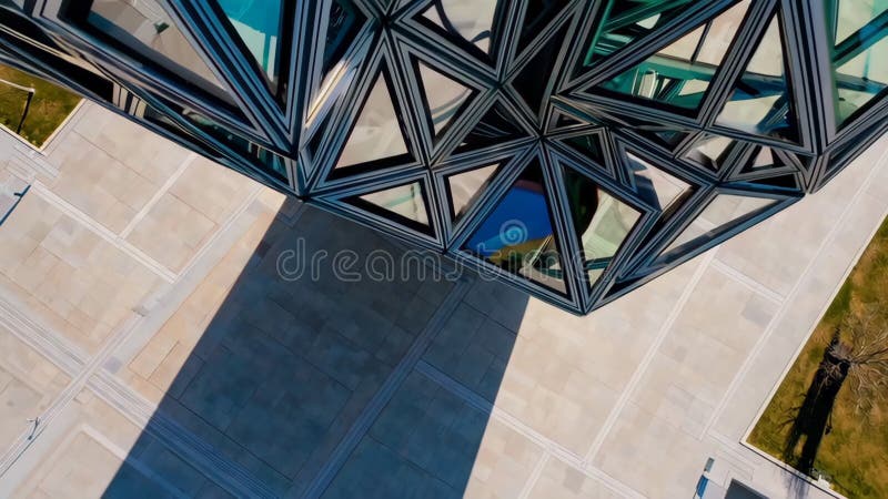 Modern Building with Triangular Glass Facade Rotating Stock Footage ...
