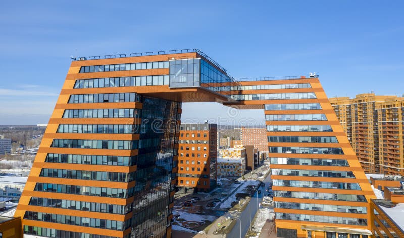 A Modern Building with Two Towers and a Glass Passage between Them ...
