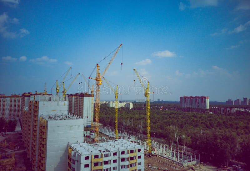 Modern Building Under Construction with Crane. Building with a High ...