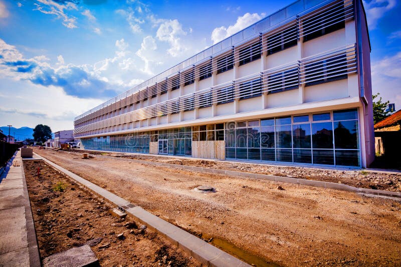 Modern Building Under Construction and Works on the Road Stock Image ...