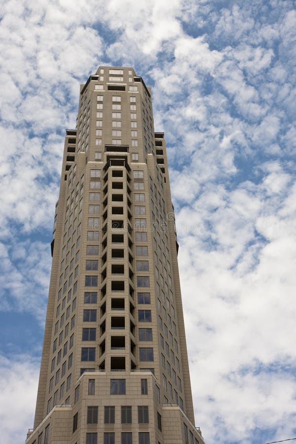 Modern Buildingi into Clouds Stock Image - Image of glass, city: 12254245