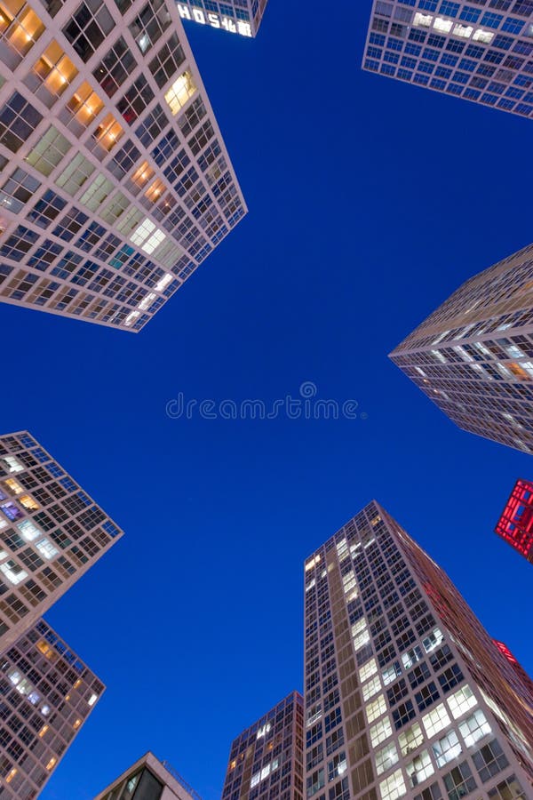Modern buildings at night stock photo. Image of clouds - 61862956