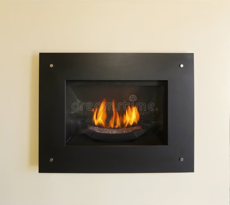 Modern built-in fireplace with fire in black color, Modern built-in ...