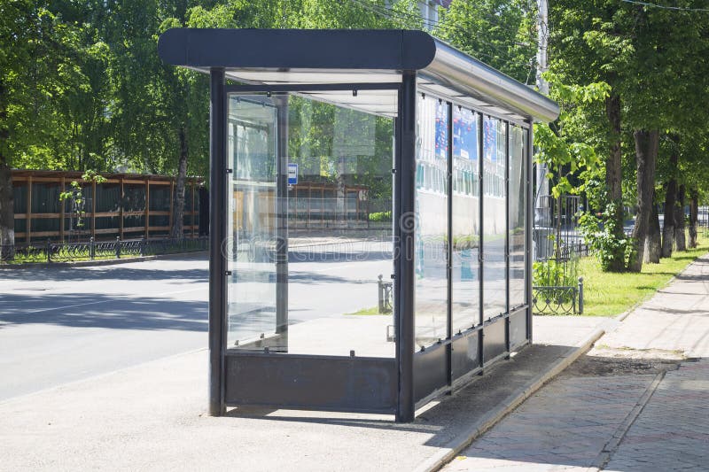 A Modern Bus Stop.Glass Bus Stop Stock Photo - Image of advertising ...