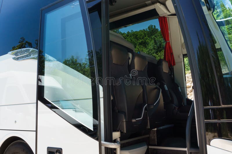 Modern Buses for Transporting People Stand at the Bus Stop. Close-up of ...