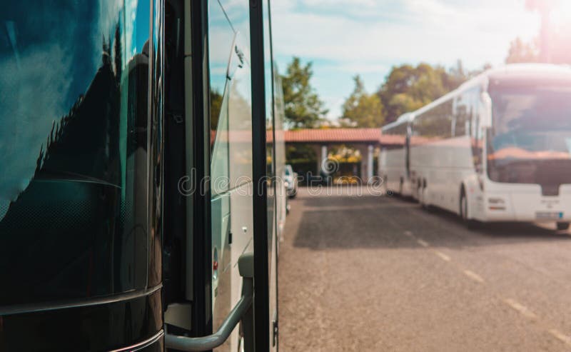 Modern Buses for Transporting People Stand at the Bus Stop. Close-up of ...