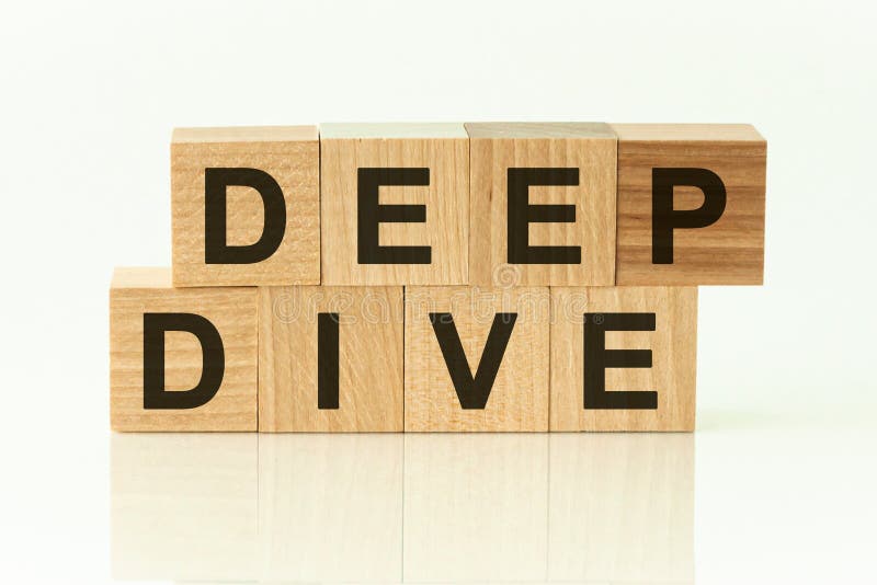 Modern Business Buzzword - Deep Dive. Top View on Wooden Table with ... Modern Business Buzzword - Deep Dive. Top View on Wooden Table with ...
