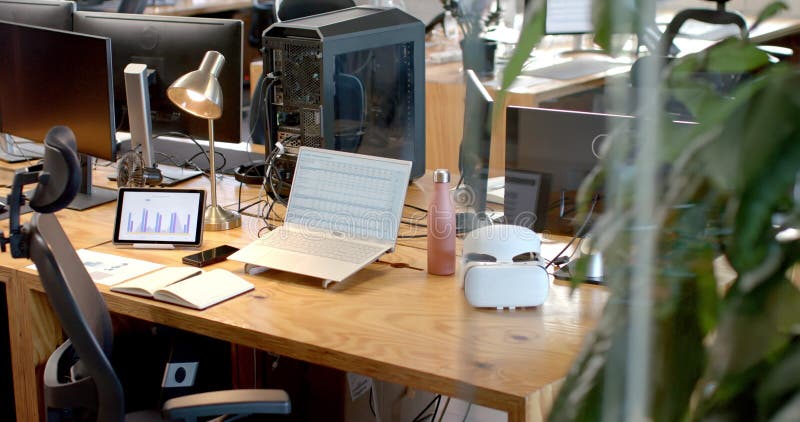A Modern Business Office Desk Setup with Multiple Screens and Gadgets ... A Modern Business Office Desk Setup with Multiple Screens and Gadgets ...