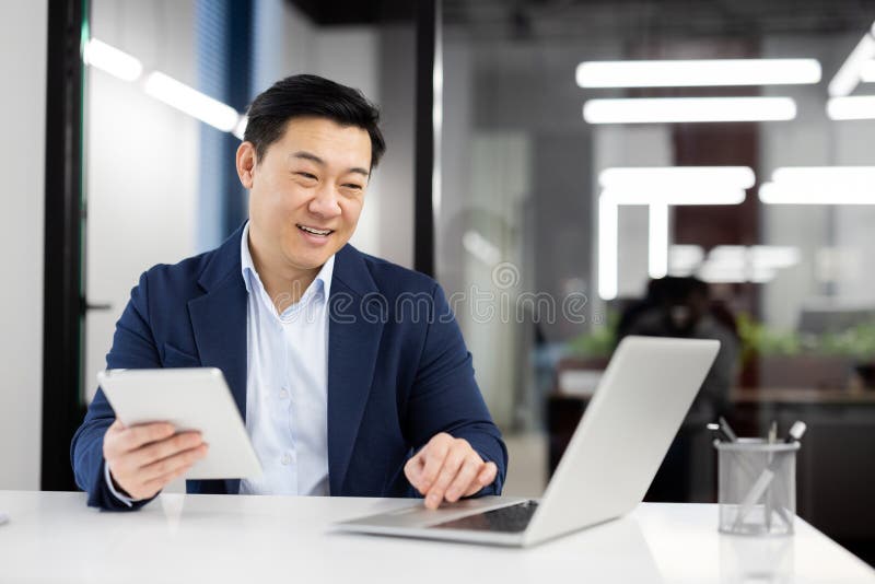 Modern Businessman in Formal Clothes Using Digital Tablet while Working ...