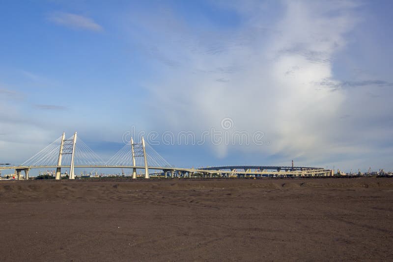 Modern Cable-stayed Bridge on the Background of the Road Over the City ...