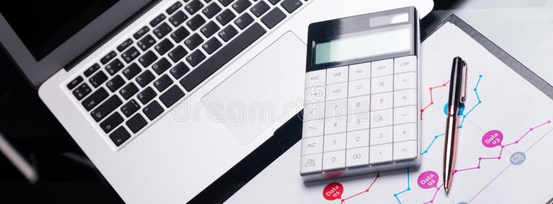 Modern Calculator is on a Laptop and on a Sheet with a Graph Stock ...