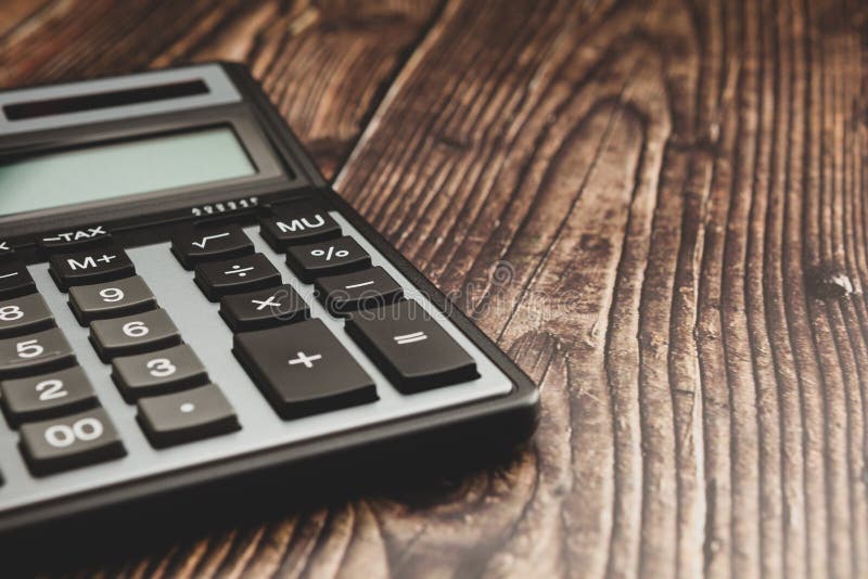 Modern Calculator on a Wooden Table, Business Concept Stock Photo ...