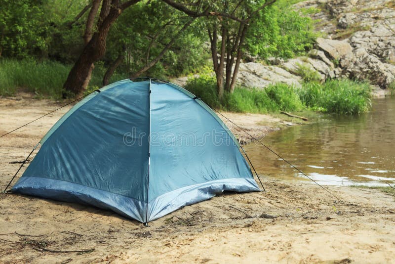 Modern Camping Tent on Riverbank Stock Image - Image of camp, hiking ...