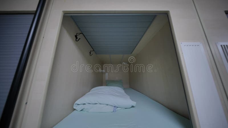 Modern Capsule Hotel Offering Comfortable and Private Sleeping Pods ...
