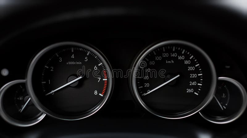 Modern Car Dashboard with RPM and Miles Per Hour Speedometer Close Up ...