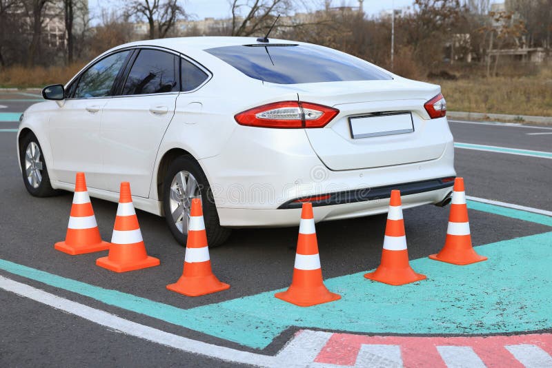 Modern Car on Driving School Test Track with Traffic Cones Stock Image ...