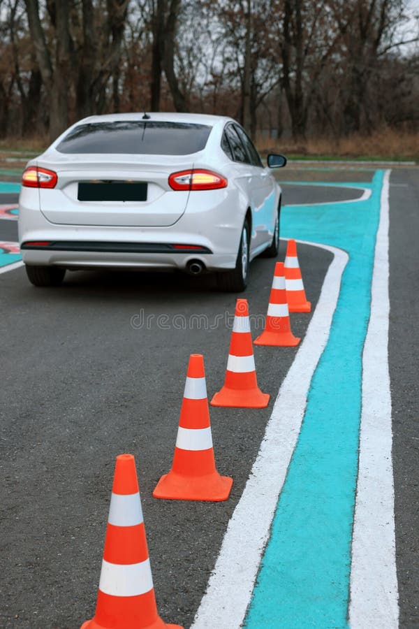 Modern Car on Driving School Test Track with Traffic Cones Stock Photo ...
