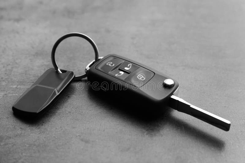 Modern Car Flip Key with Trinket on Grey Background, Closeup Stock ...