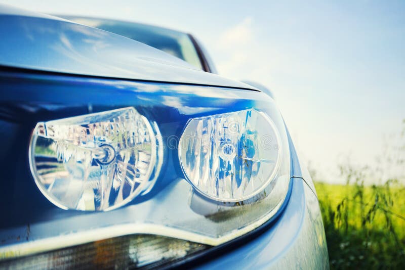 Modern car headlights stock photo. Image of lights, bumper - 148365478