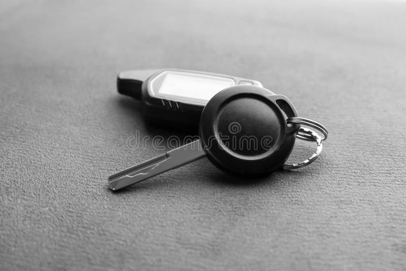 Modern Car Key with Remote Control on Grey Fabric, Closeup Stock Image ...