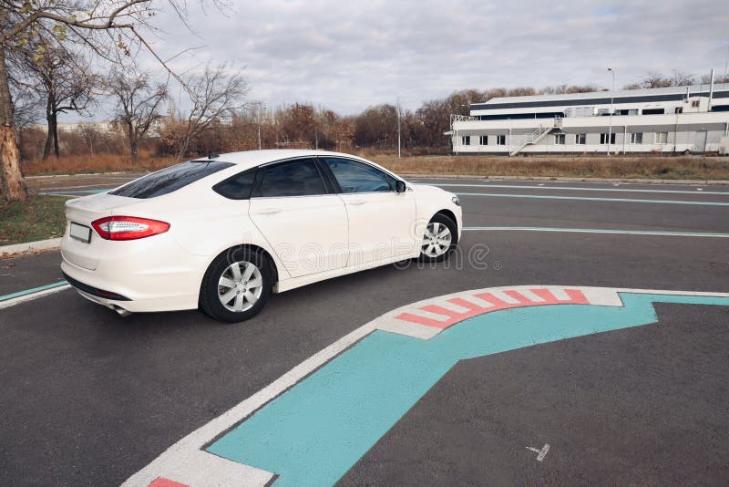 Modern Car on Test Track with Traffic Cones, Low Angle View. Driving ...