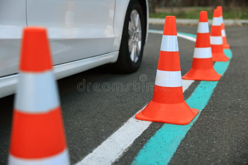Modern Car on Test Track with Traffic Cones, Closeup. Driving School ...